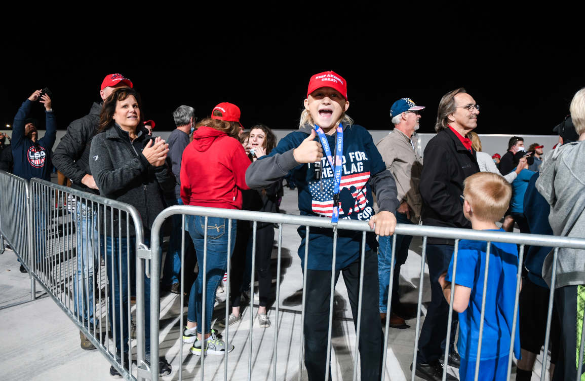 People in overflow area of Des Moines Trump rally - Little Village