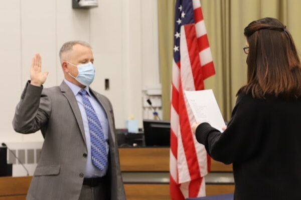Dustin Liston sworn in as Iowa City police chief as ICPD reform efforts ...