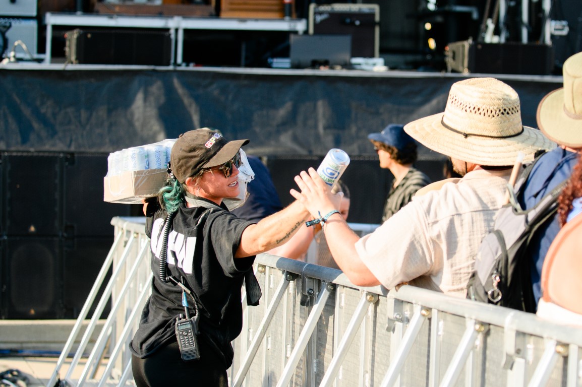 crew-members-handing-out-water-and-ice-2 (Medium) - Little Village